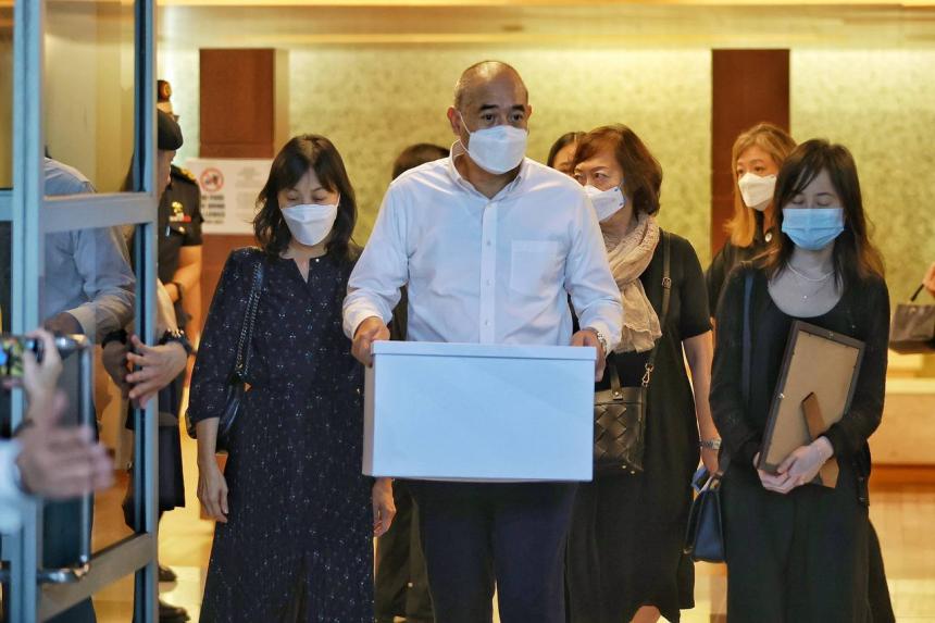 Family and friends bid farewell to NSF firefighter Edward Go at ceremonial funeral in Mandai ...