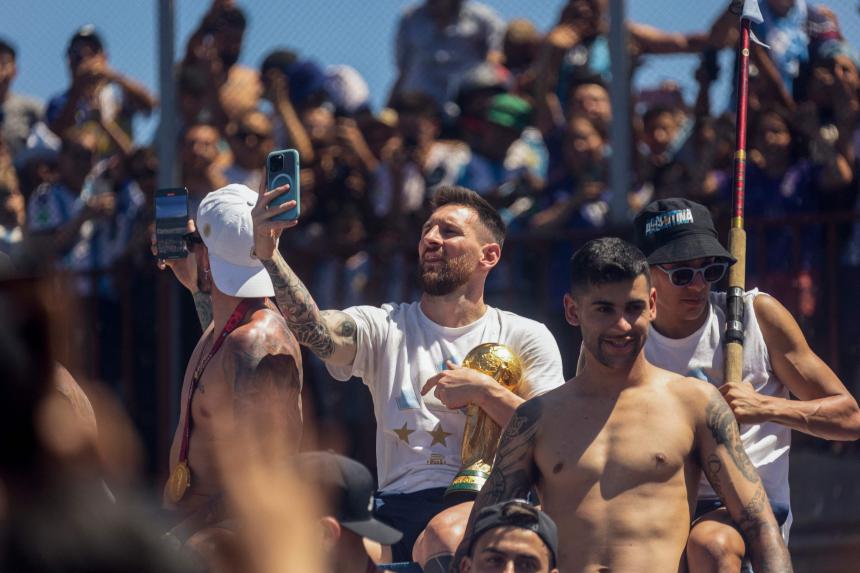World Cup: Argentine players airlifted as millions flood Buenos Aires ...