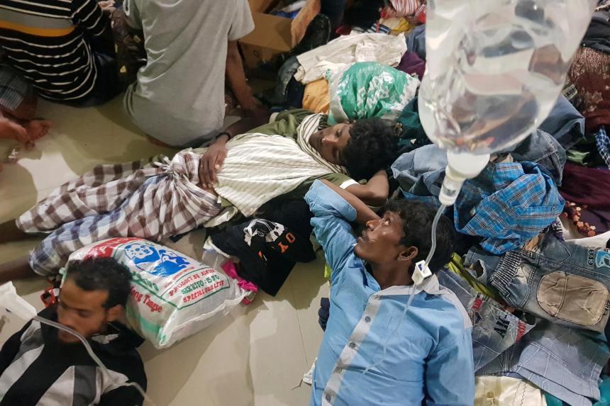 Rohingya refugees get emergency treatment after boat lands in Indonesia ...