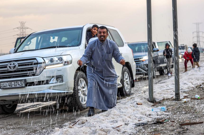 Rare hail brings winter white to desert hot spot Kuwait | The Straits Times