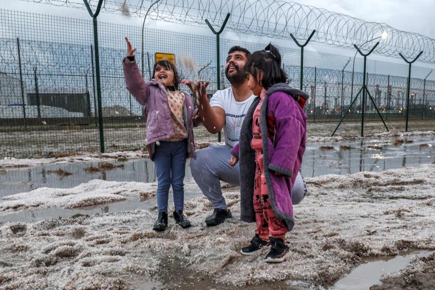 Rare hail brings winter white to desert hot spot Kuwait | The Straits Times