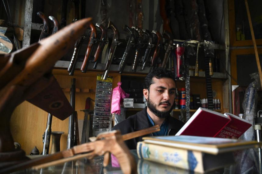 Library thrives in Pakistan's 'wild west' gun market town | The Straits ...