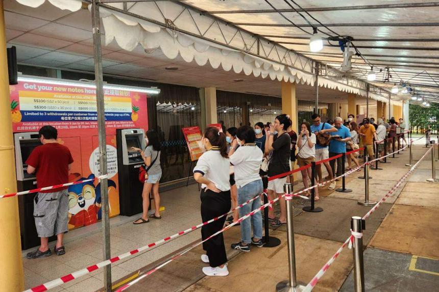 Tradition comes first as many brave long queues at some pop-up ATMs for ...