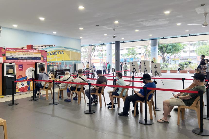 Tradition comes first as many brave long queues at some pop-up ATMs for ...