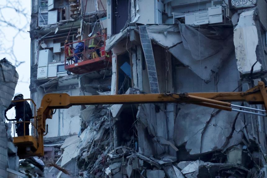Ukraine ends search at missile-hit tower block | The Straits Times