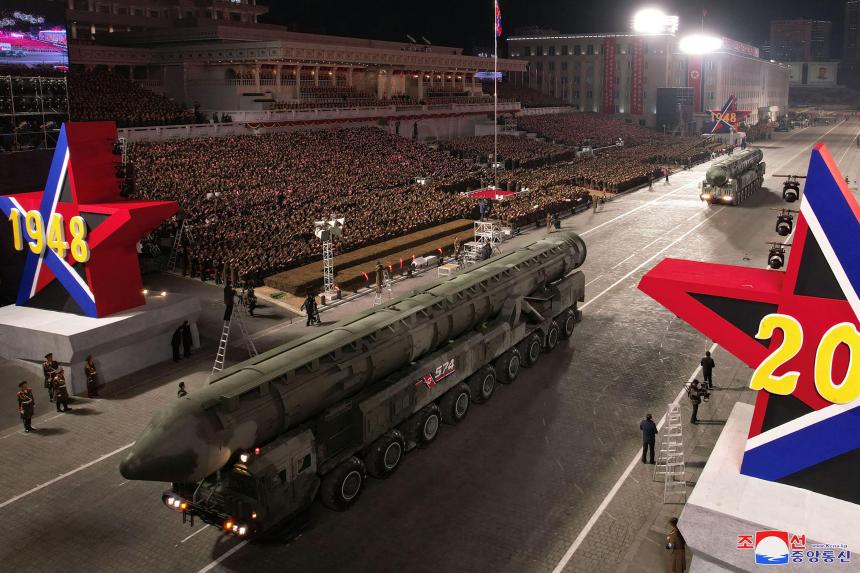 North Korea shows off possible solid-fuel ICBM at night-time parade ...