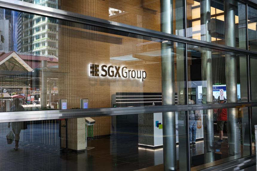 Singapore stocks end week flattish as investors await Budget, earnings ...