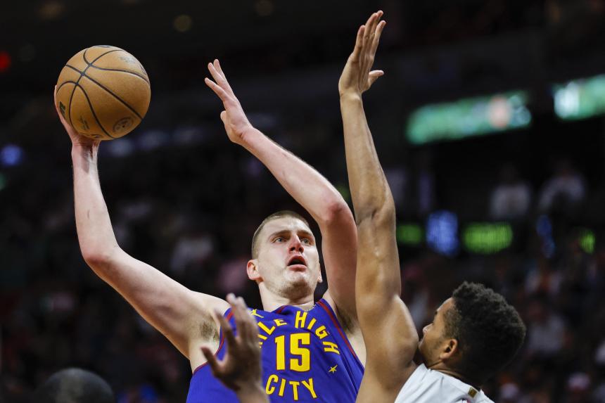 NBA: Nikola Jokic, Nuggets hold off Heat in Miami | The Straits Times