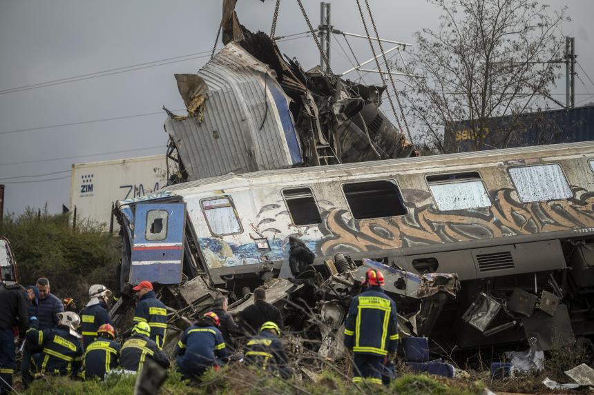 Greek train crash toll rises as rescuers comb through charred wreckage ...