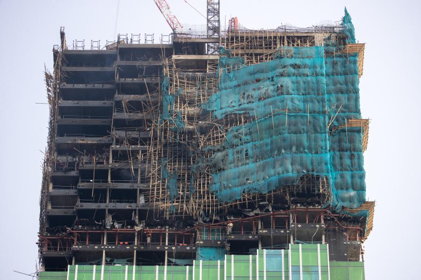 Massive fire engulfs Hong Kong high-rise construction site | The Straits Times