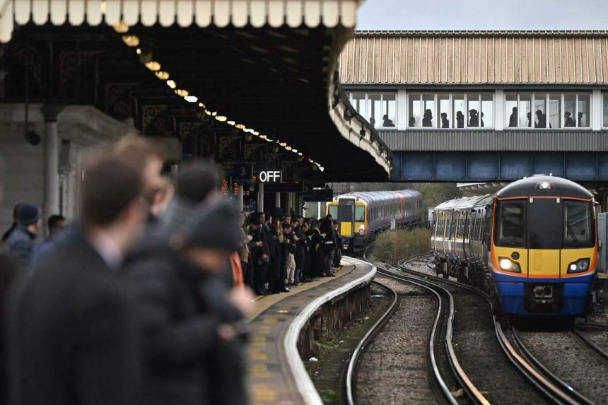 Striking UK rail workers accept pay deal | The Straits Times