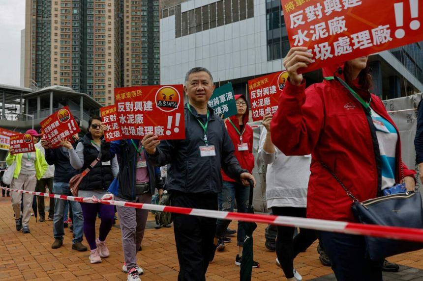 Hong Kong police keep tight tabs on first authorised protest in years ...