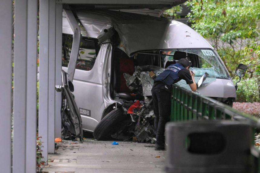 Driver taken to hospital after van crashes into covered walkway at ...