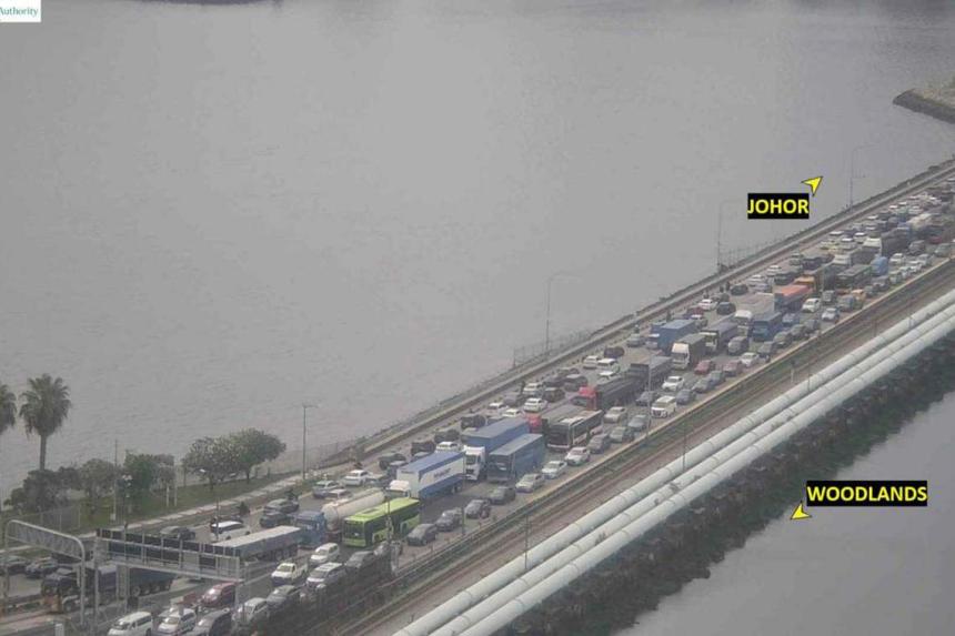 Heavy traffic towards Malaysia at Woodlands, Tuas checkpoints ahead of ...