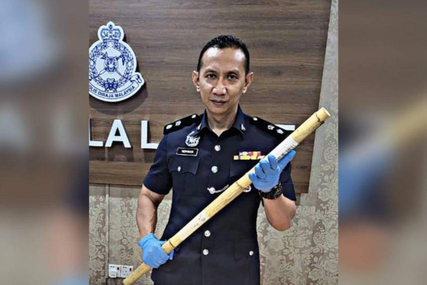 Malaysian police arrest five men for slashing and throwing woman under ...