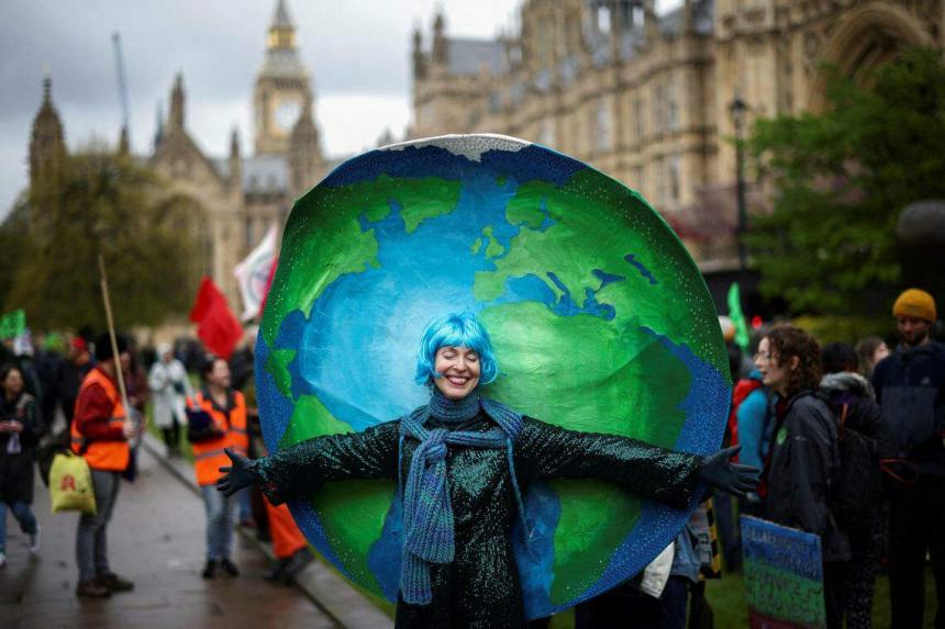 Activists gather for Earth Day, urge action to avoid 'dystopian' future ...
