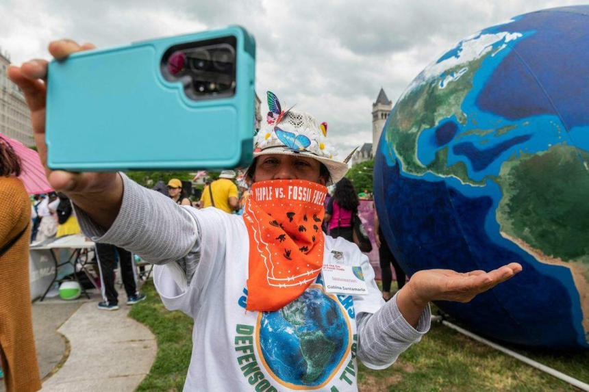 Activists gather for Earth Day, urge action to avoid 'dystopian' future ...