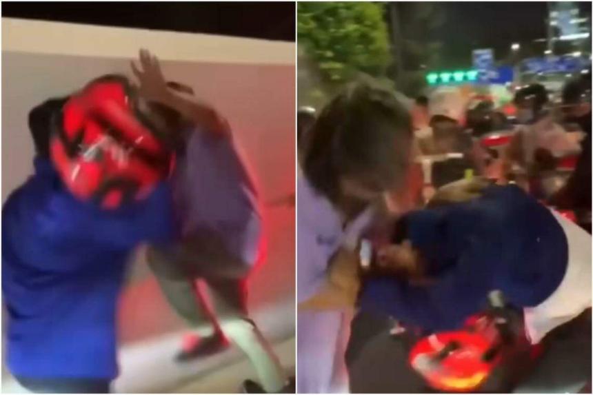 Police investigating 2 men for fighting with motorcycle helmets at ...