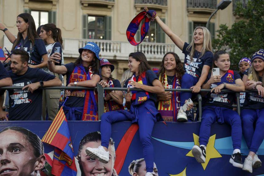 Barca fans celebrate league titles with players in parade | The Straits ...