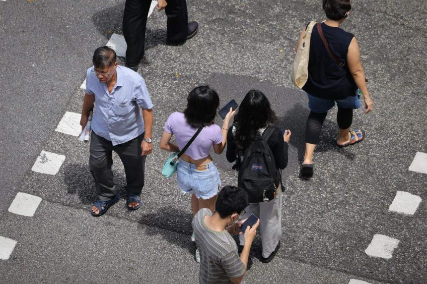 Deadly addiction: Why do some pedestrians use their phones despite the ...