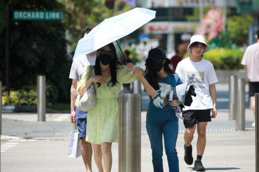 Singapore to launch guide on how to live and play in hotter weather ...