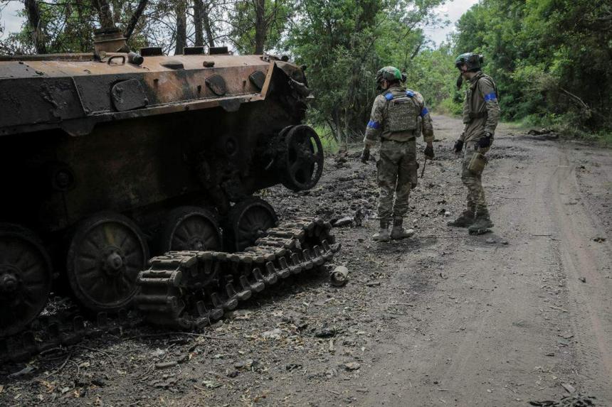 Russian soldiers’ corpses line road into liberated Ukrainian village ...