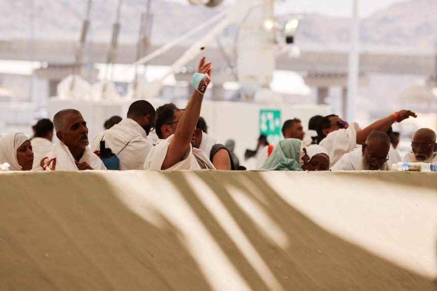 Huge crowds ‘stone the devil’ as fiercely hot haj in Saudi Arabia winds ...