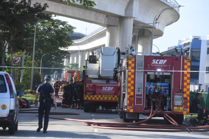 Huge fire in Tuas industrial building causes $10m in losses; MRT ...