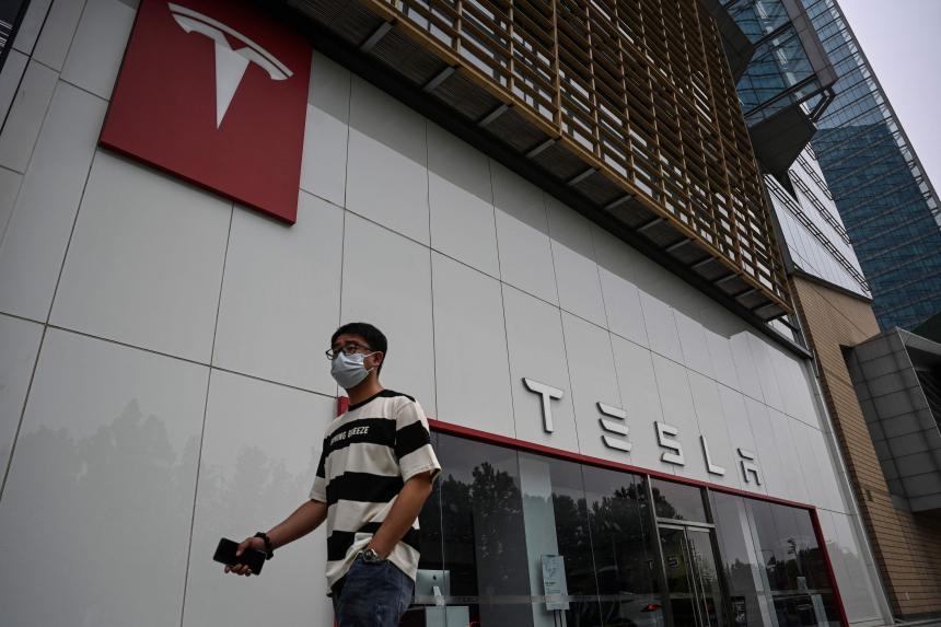 Tesla and Chinese rivals signal truce after brutal EV price war | The ...