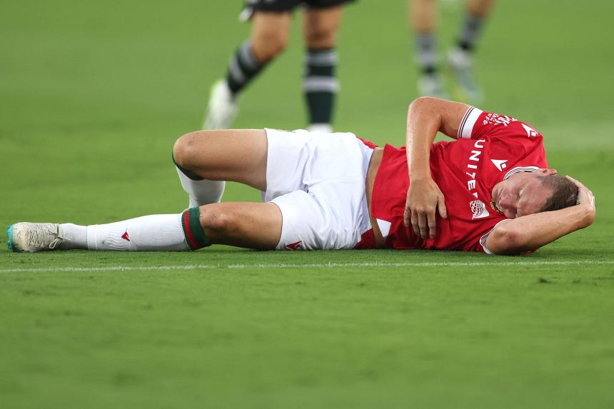 Wrexham striker Paul Mullin punctures lung in pre-season win over ...