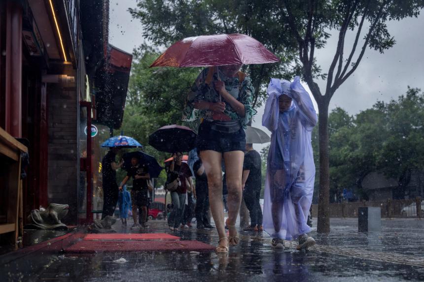 Tens of thousands evacuated in Beijing as northern China hit by ...