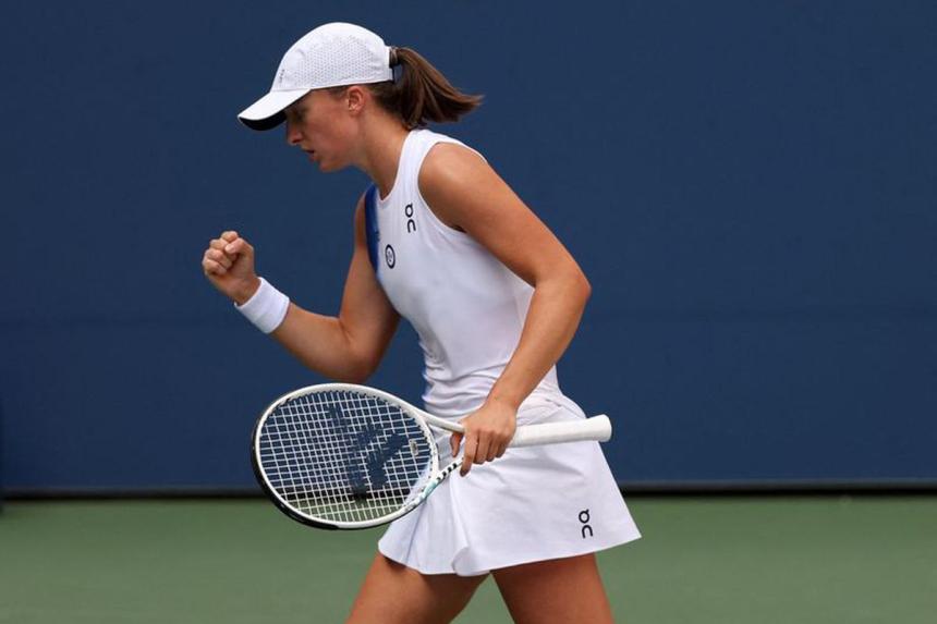 Swiatek tames feisty Saville to reach US Open third round | The Straits ...