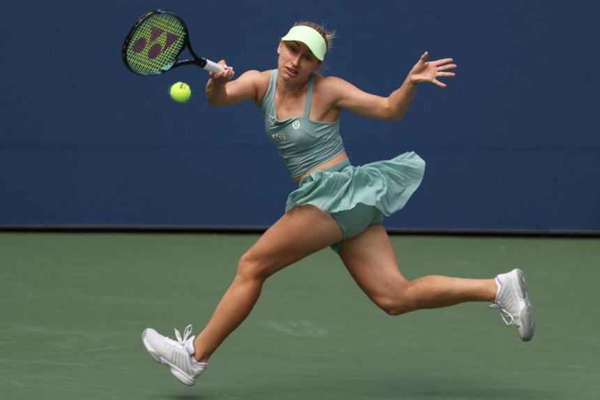 Swiatek tames feisty Saville to reach US Open third round | The Straits ...