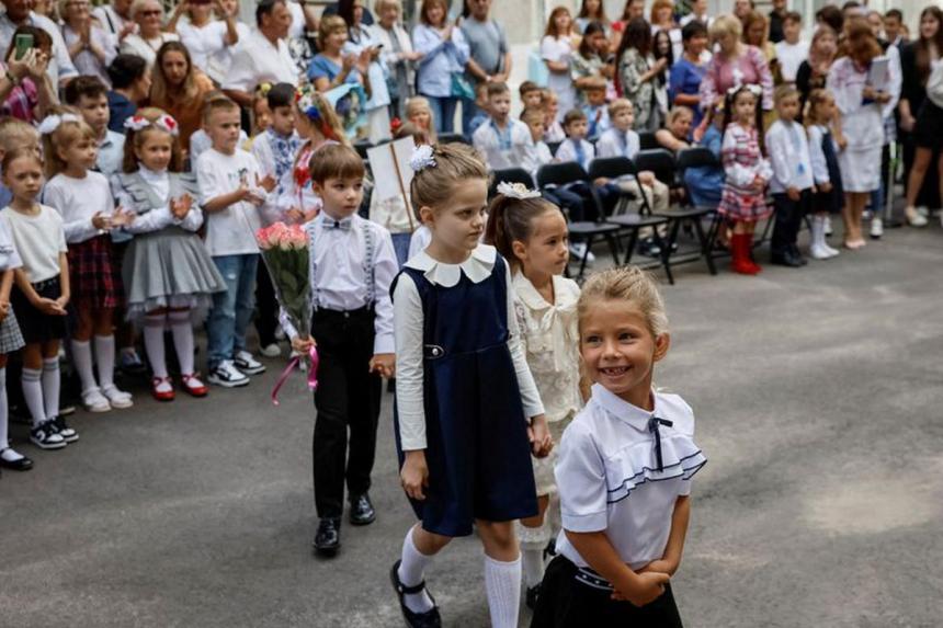 Ukrainian children head below ground at start of new school year | The Straits Times
