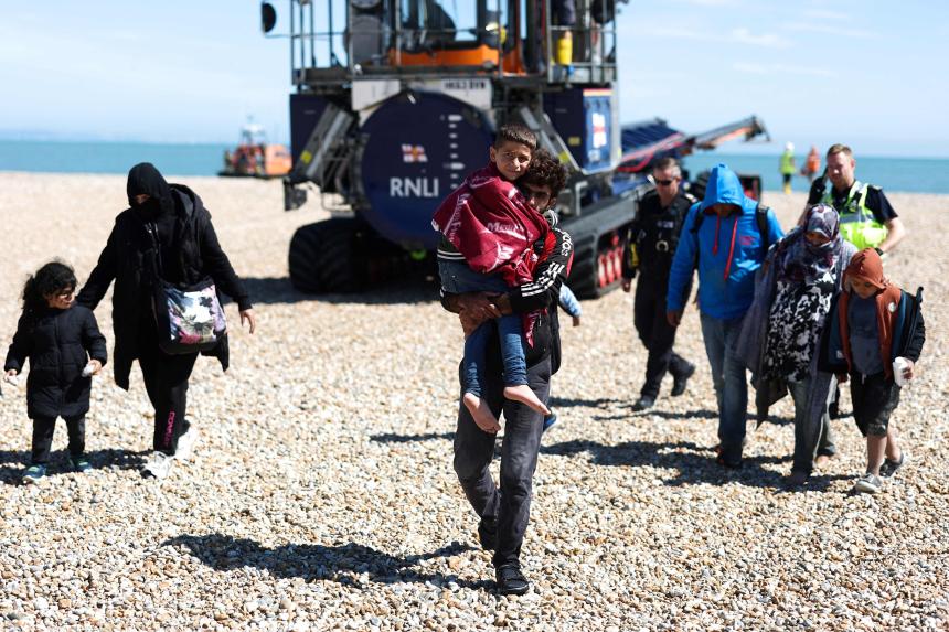 Channel migrant crossings hit 872 in new daily record for 2023: Britain ...
