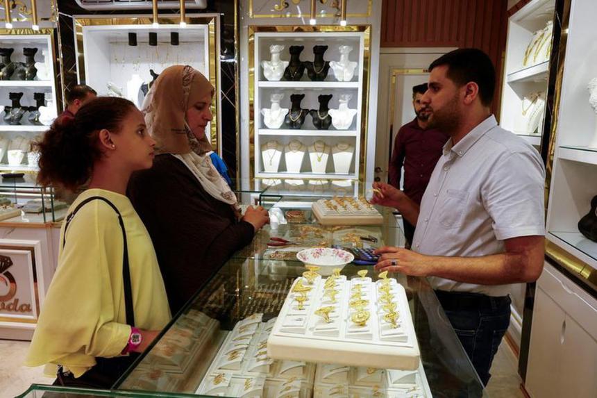In Gaza, little gold coins help the poor to save | The Straits Times