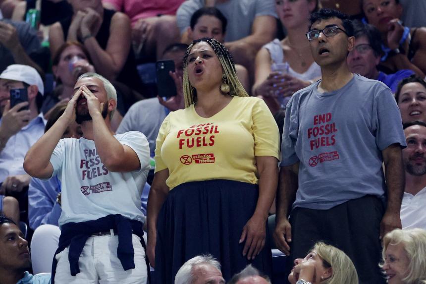 US Open semi-final disrupted by climate protesters, including one who ...