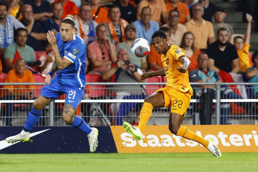 Early Dutch blitz sinks Greece | The Straits Times