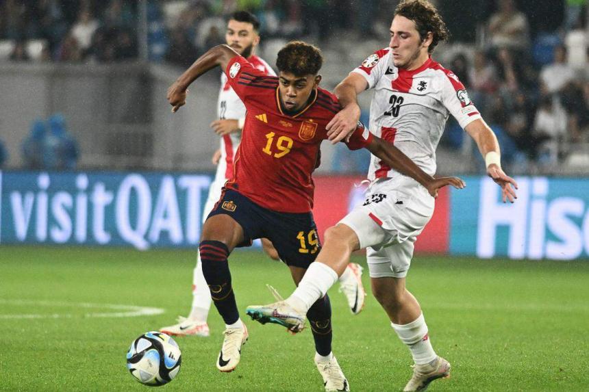 Lamine Yamal makes history for Spain in 7-1 win over Georgia, as ...