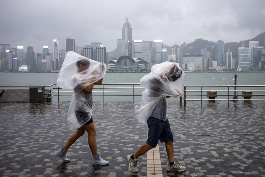 Hong Kong schools to operate normally for part of day as heavy rain ...
