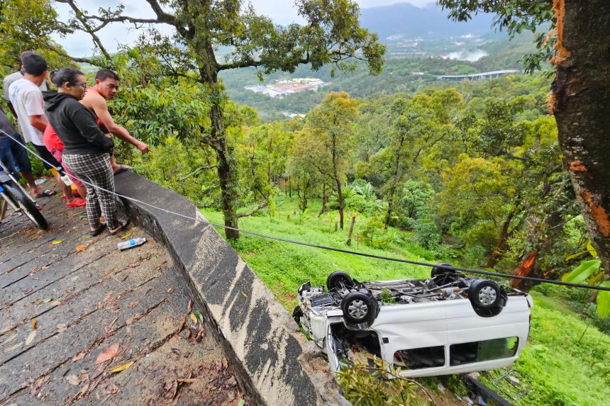 Residents use rocks to smash windows to rescue trapped Singapore ...