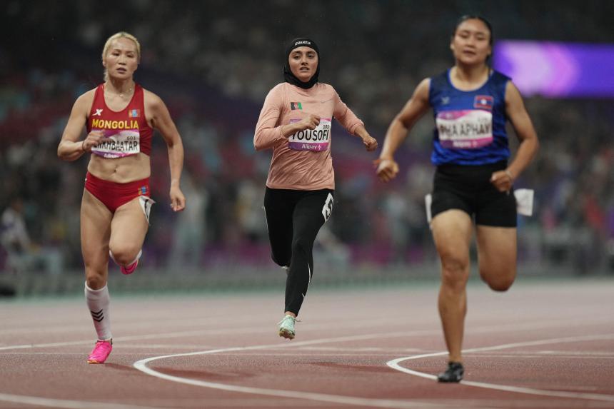 Afghan woman sprinter sends message of defiance at Asian Games | The ...