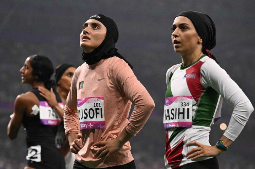 Afghan woman sprinter sends message of defiance at Asian Games | The ...