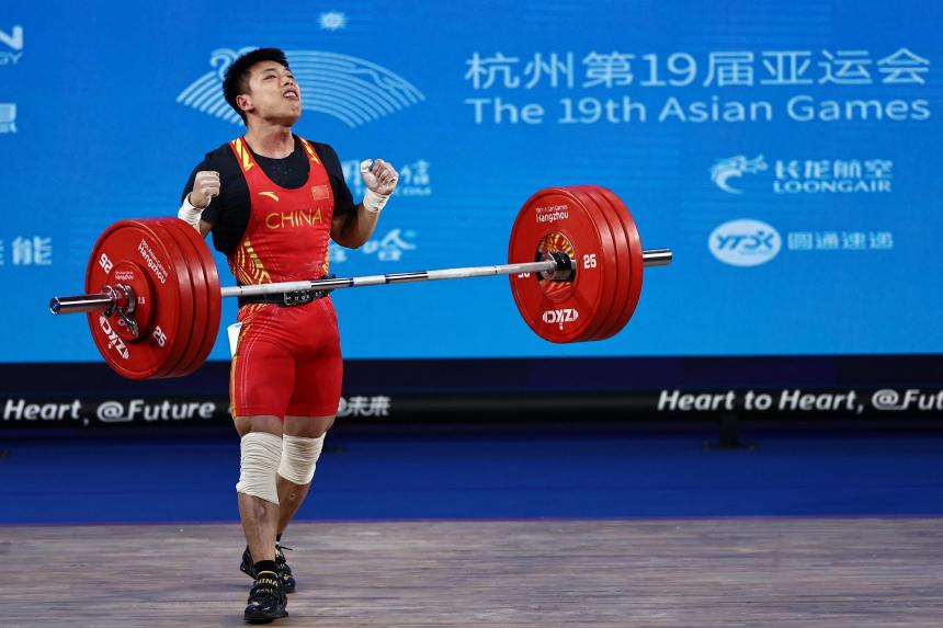 China’s ‘poorest Olympic weightlifting champion’ Chen Lijun wins men’s ...