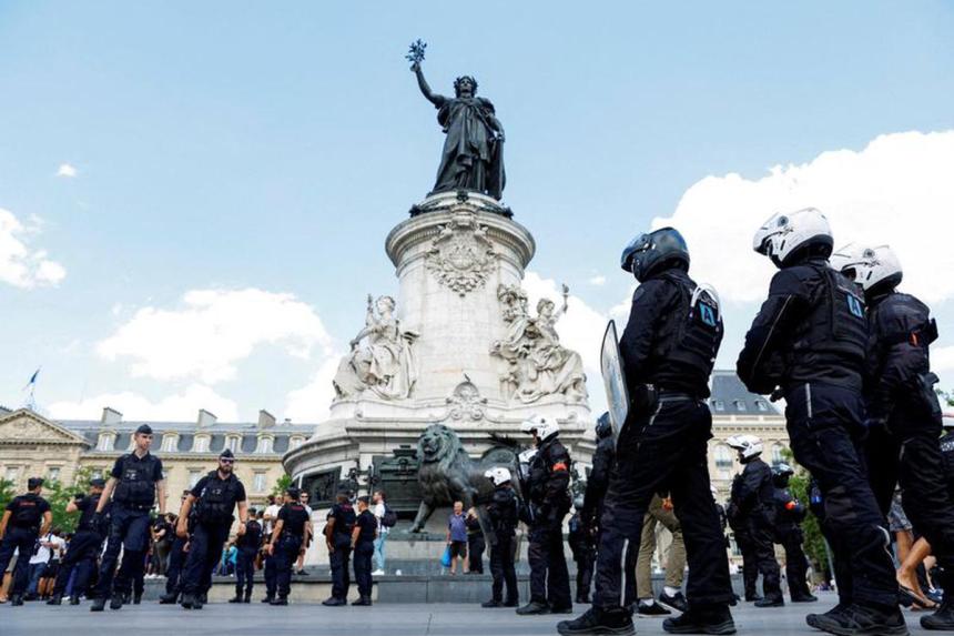 French court rules police must clearly display ID number | The Straits ...