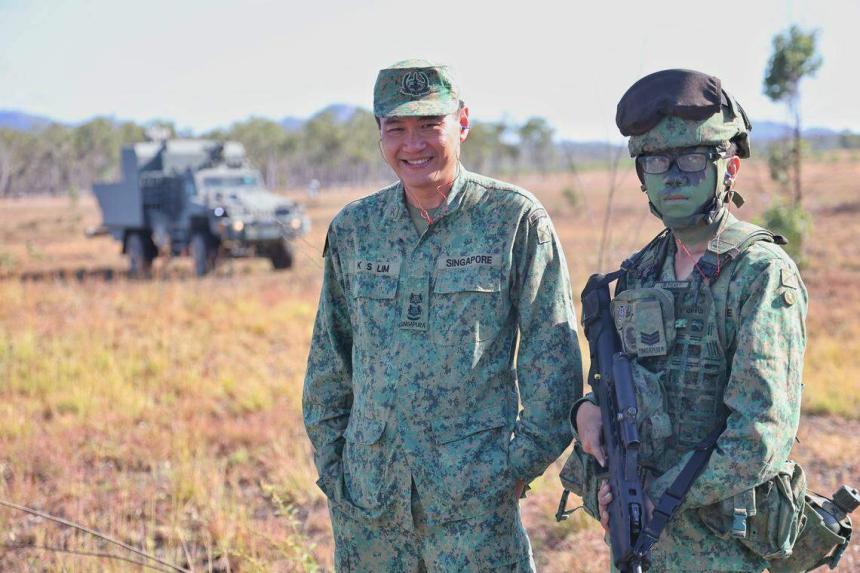 Father and son bond over shared army experience at Exercise Wallaby ...