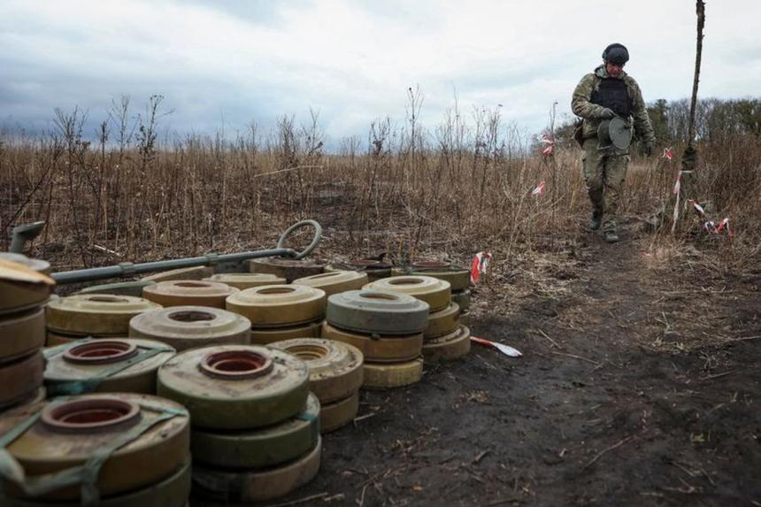 Despite losing limbs, Ukrainian sappers return to work clearing land ...