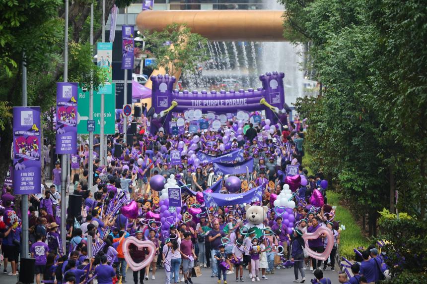Over 13,000 people turn up at annual Purple Parade to show support for ...