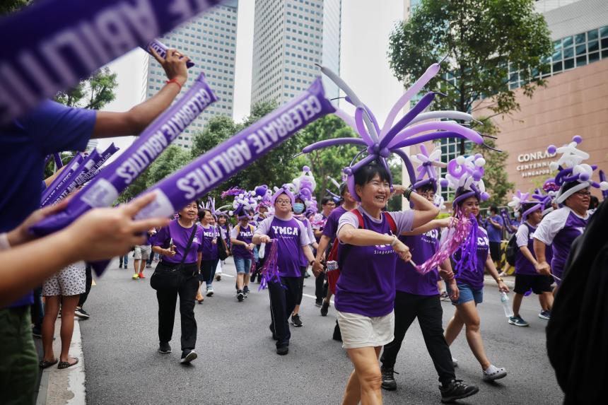 Over 13,000 people turn up at annual Purple Parade to show support for ...