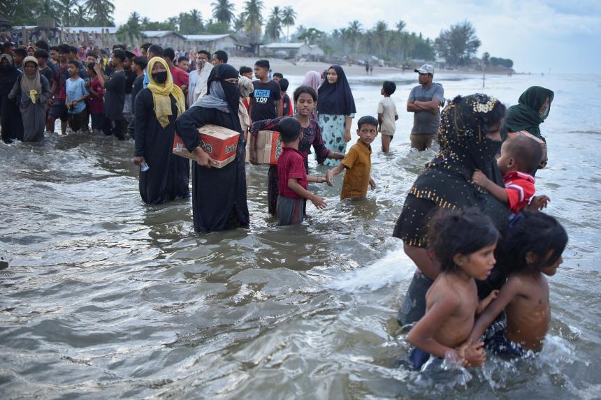 About 250 Rohingya refugees in Indonesia sent back to sea | The Straits ...
